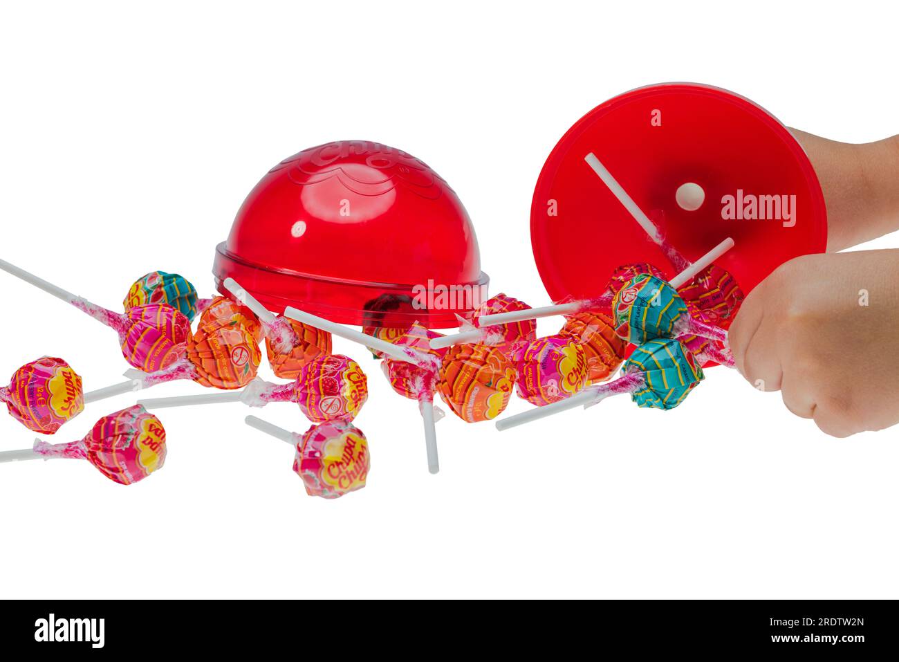 Close-up view of man's hands holding big plastic chupa chups package ...