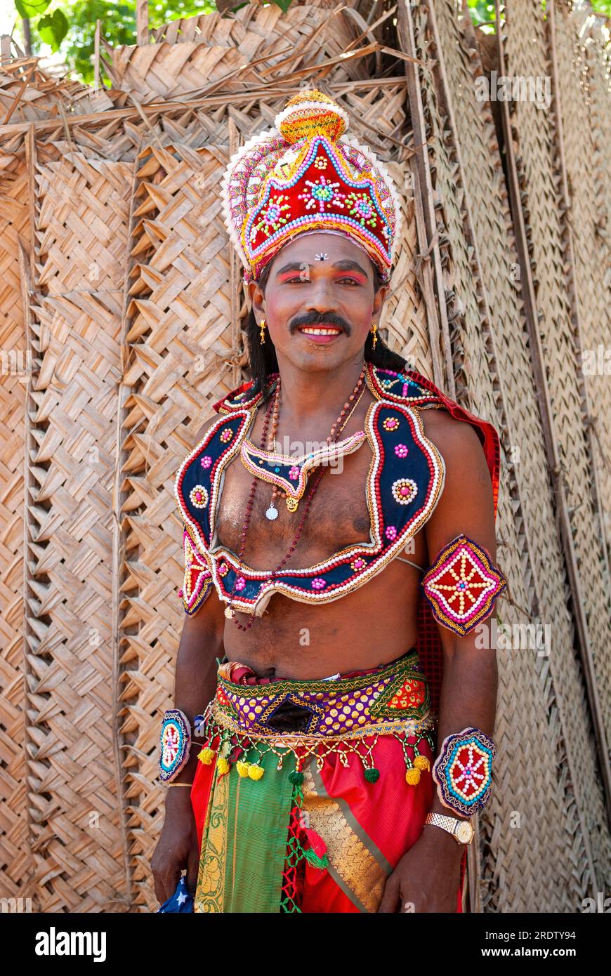 Man wearing exaggerate costumes for the purpose of offering prayers and ...