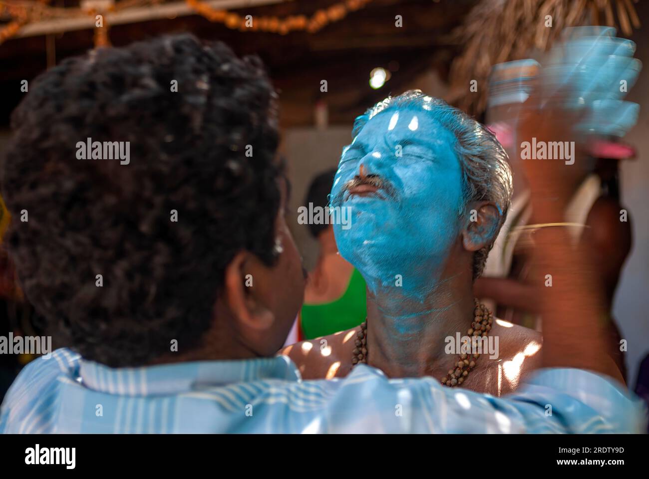Folk artist doing makeup during Dasara Dussera Dusera Festival at ...