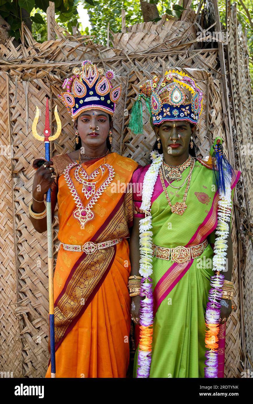 The image of Men dressed as goddess Goddess Parvathi and Meenakshi in ...