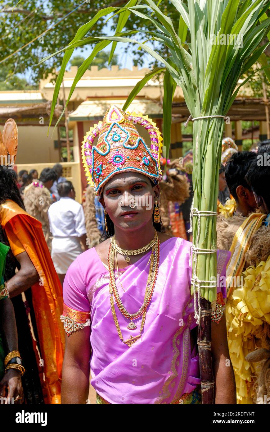 The image of Man dressed as Godess Tripura Sundari with sugarcane in ...