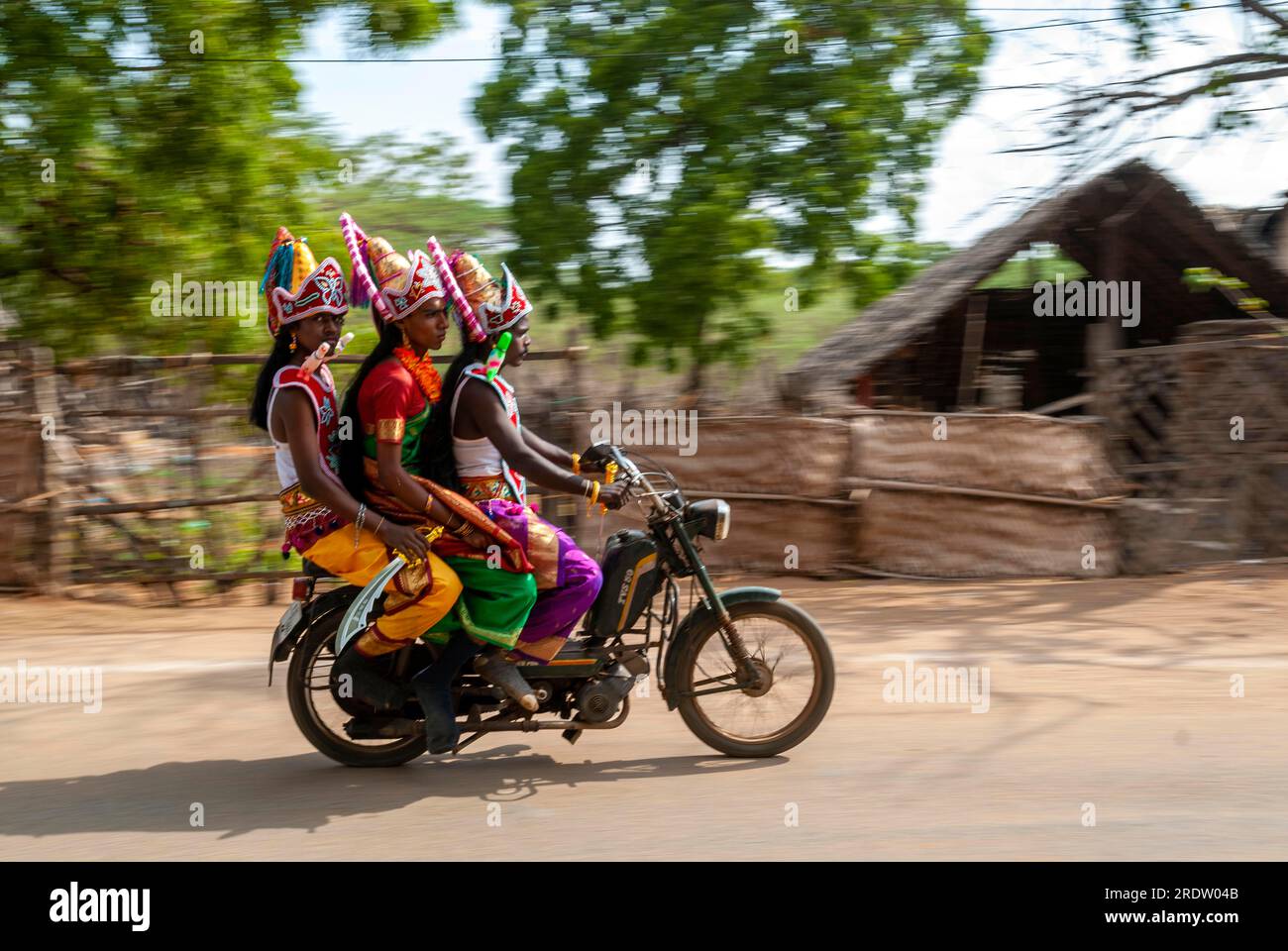 Men dress as Hindu Gods and journeying on a mophed bike during Dasara Dussera Dusera Festival at ...