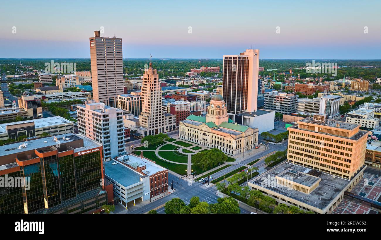 Sunrise glow over downtown city Fort Wayne IN skyscrapers and ...
