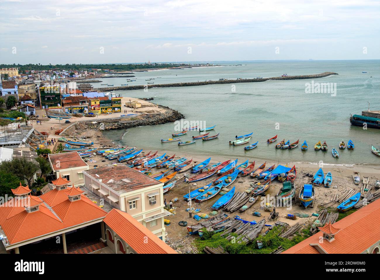 Catamaran and fishing boats and boat jetty at Kanyakumari, Tamil Nadu ...