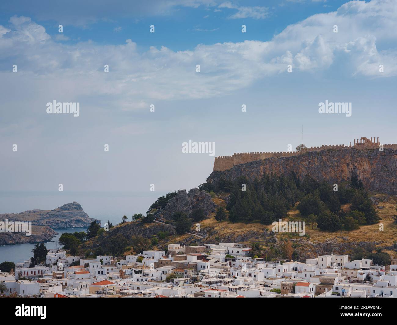 Lindos town in Greece aerial view in cloud summer day, white houses in ...