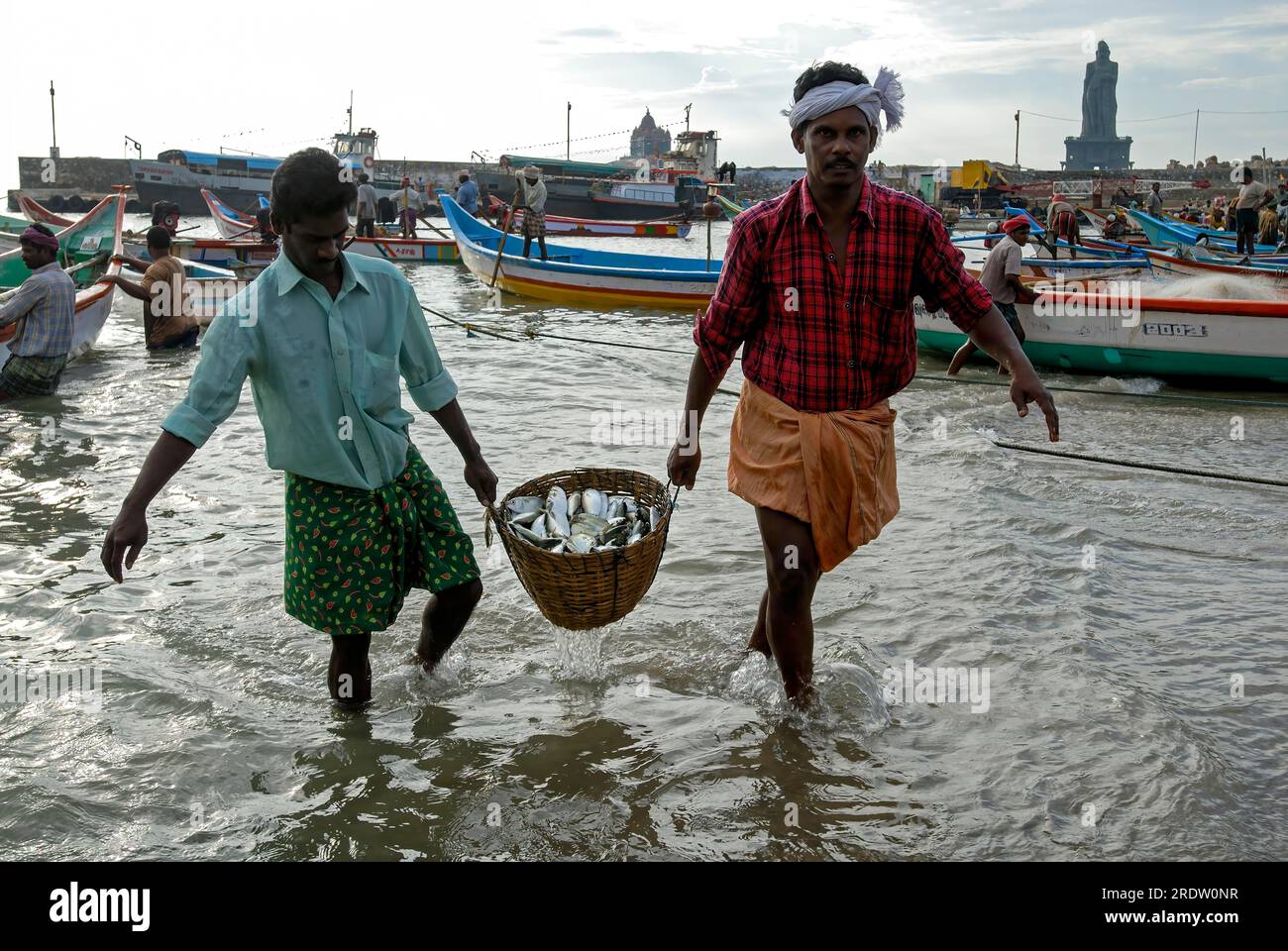 Fishermen bringing the day's catch at Kanyakumari, Tamil Nadu, South ...