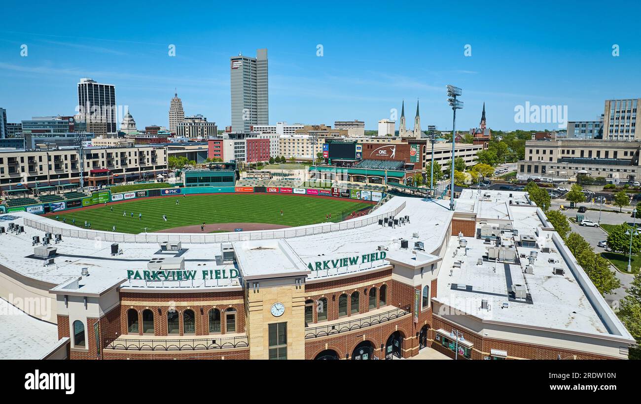 Aerial Parkview Field downtown Fort Wayne skyscraper and church steeple ...