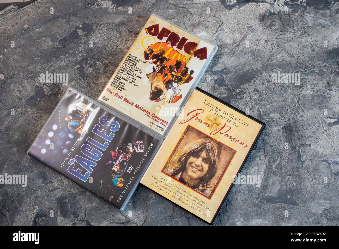 Three rock music DVDs; a tribute to the late Gram Parsons, Africa Live ...