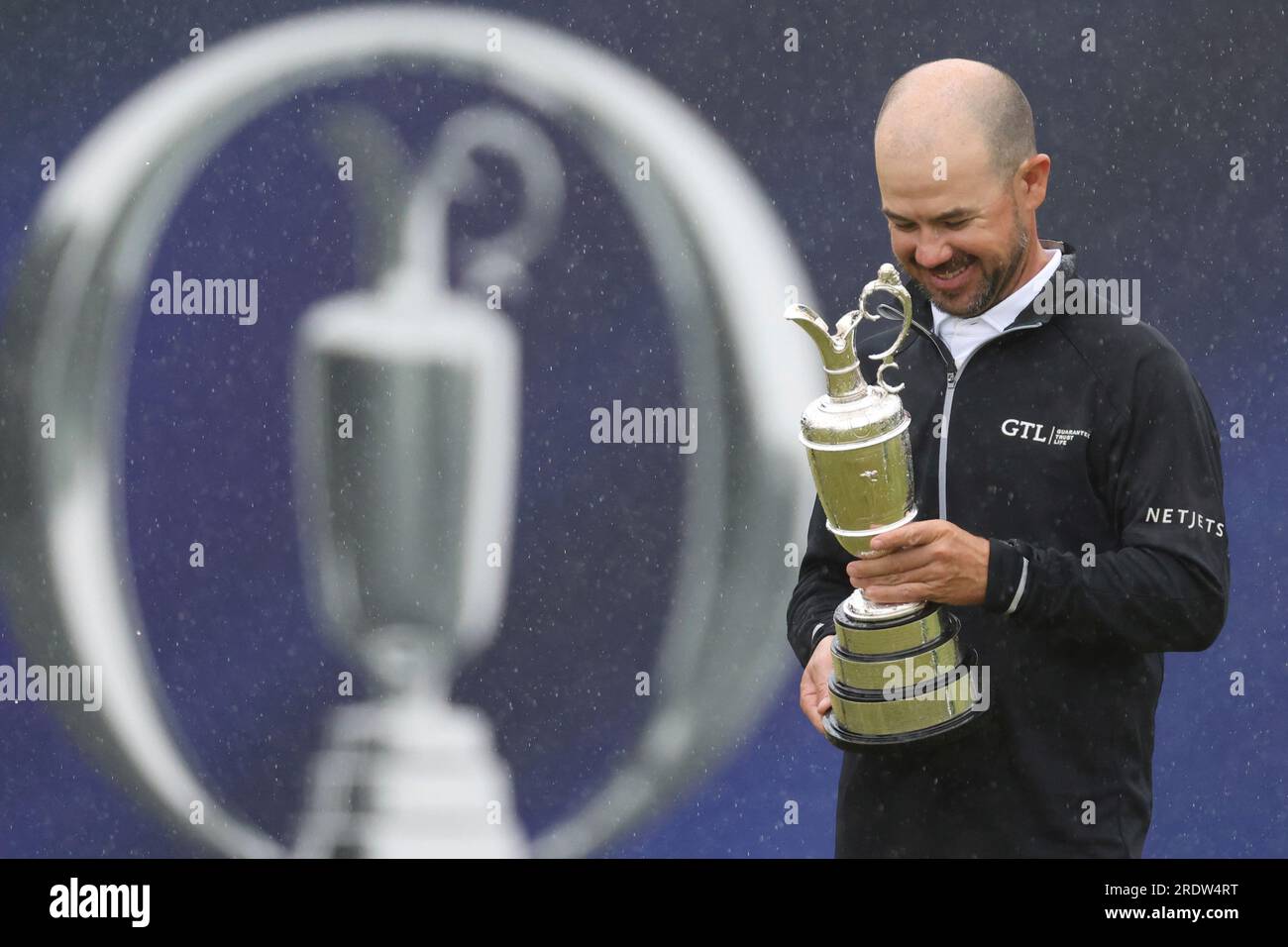 United States' Brian Harman poses for the media as he holds the Claret ...