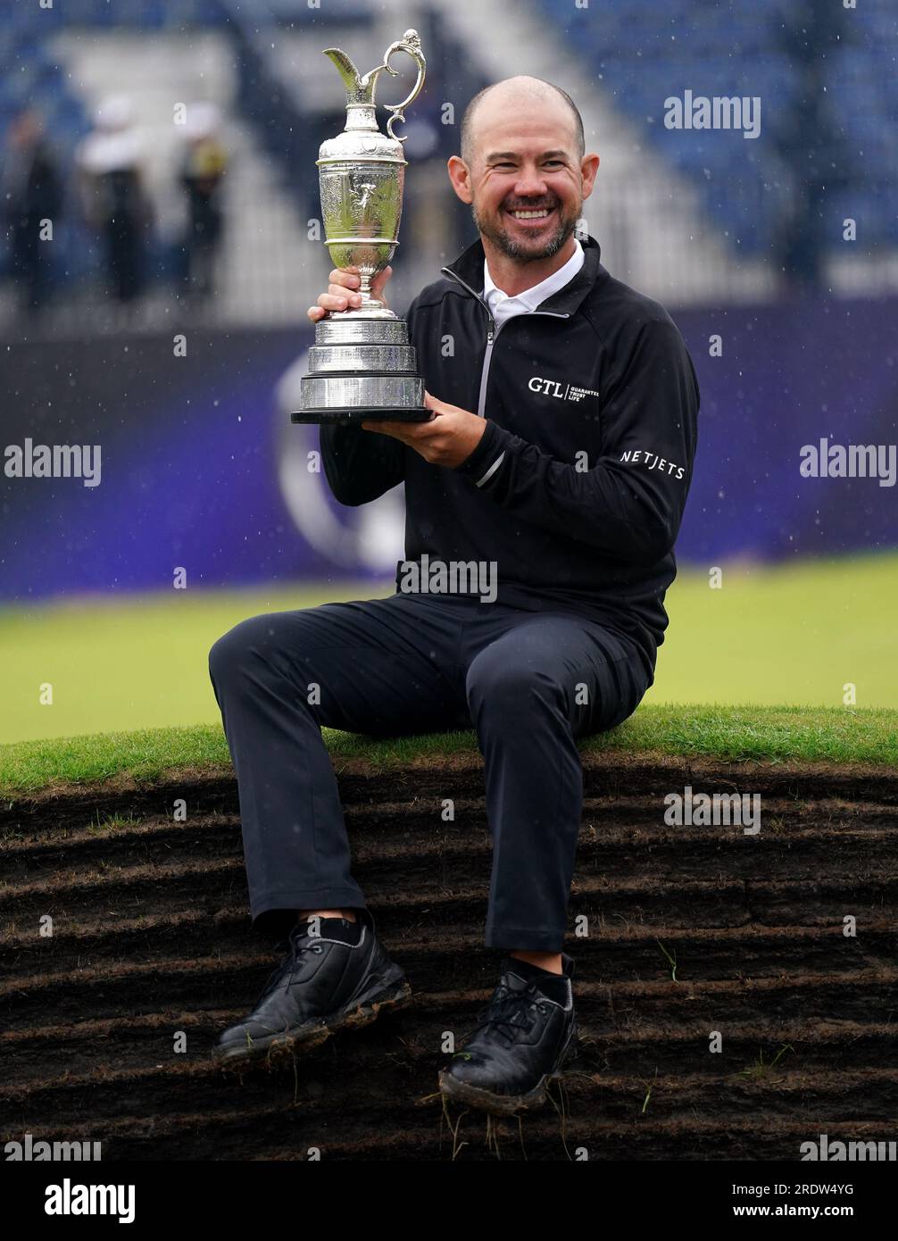 USA's Brian Harman celebrates with the Claret Jug after winning The ...