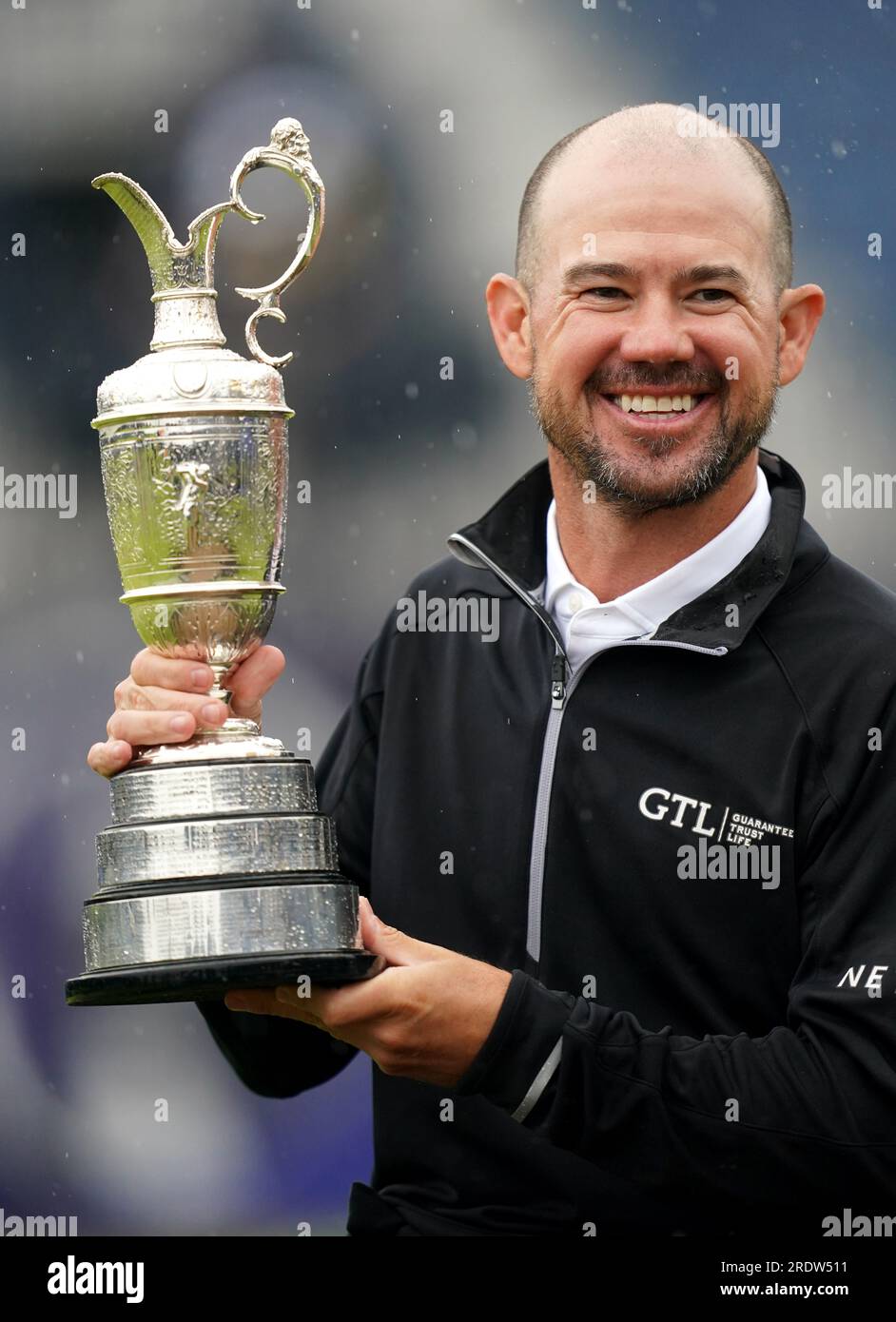 USA's Brian Harman celebrates with the Claret Jug after winning The ...