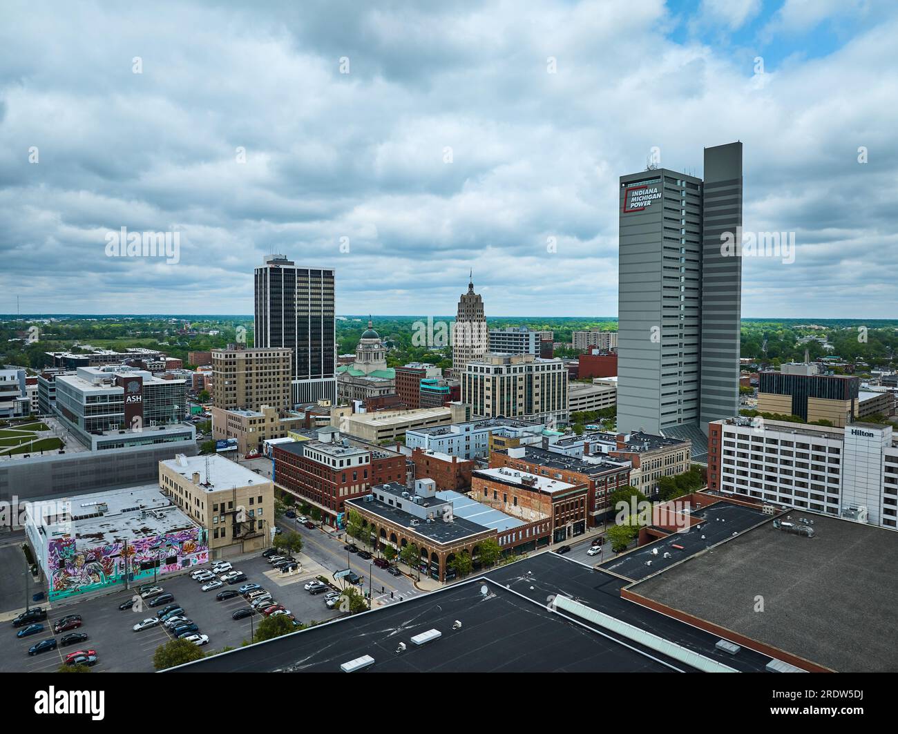 Aerial shot of downtown Fort Wayne with artwork on building wall and ...