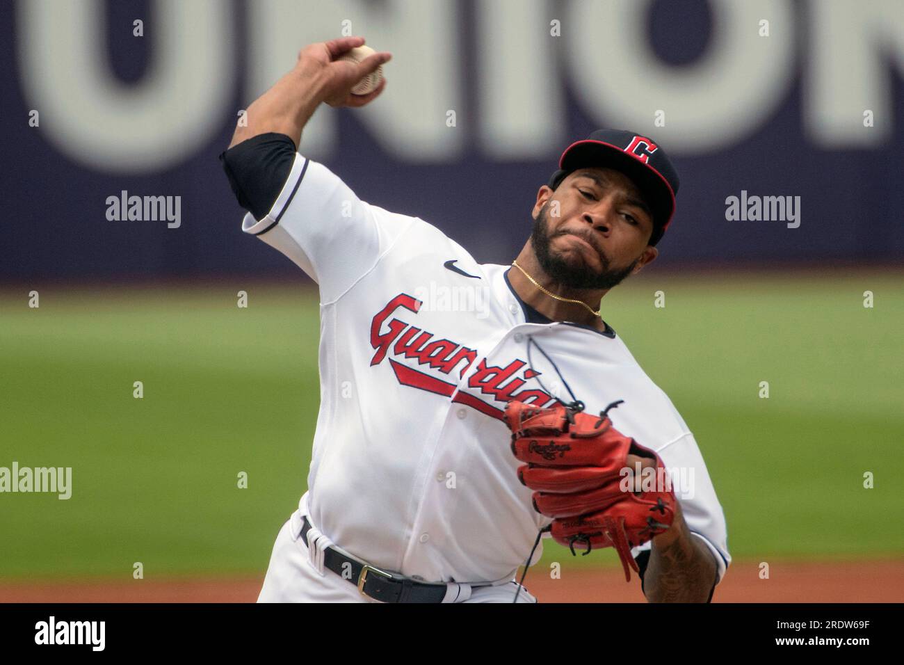 Cleveland Guardians starting pitcher Xzavion Curry delivers against the ...