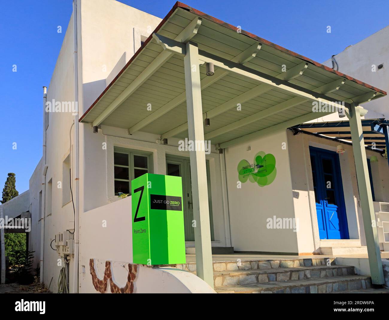 Polygreen 'Just Go Zero' office, Livadia village, Tilos Stock Photo - Alamy