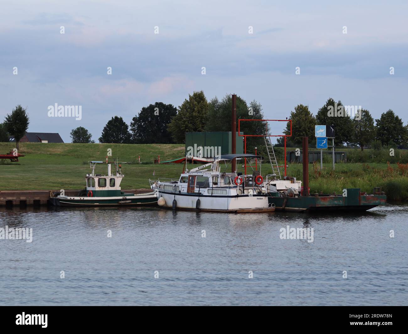 Boats in the Meuse River, The Netherlands Stock Photo - Alamy