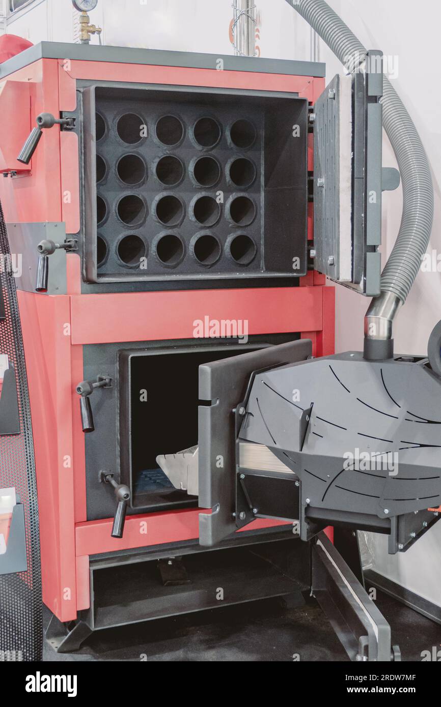 Heating boiler for solid fuel with turbocharging Stock Photo - Alamy