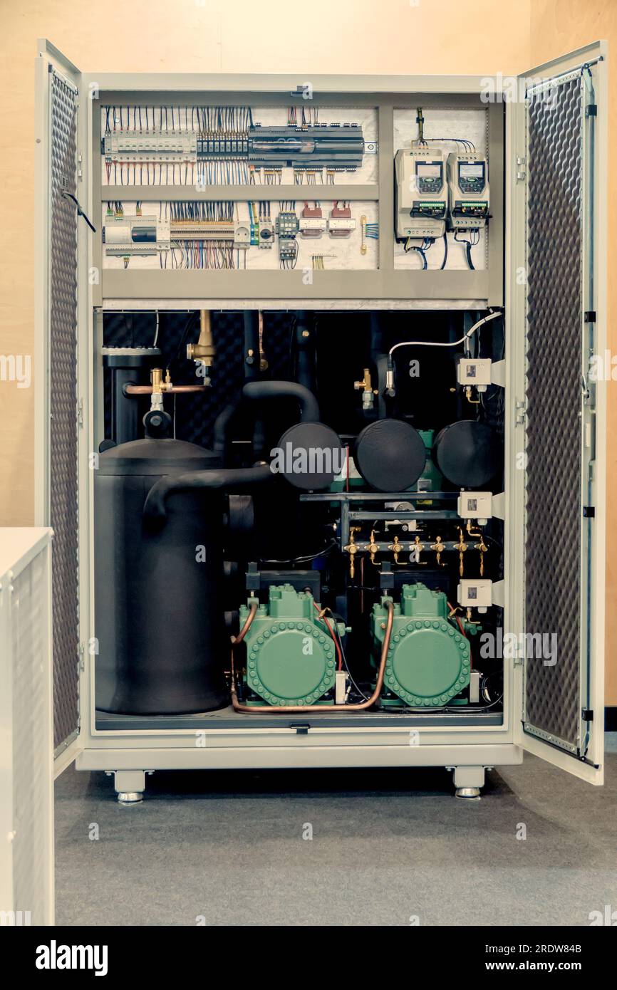 Soundproof cabinet for compressor refrigeration unit Stock Photo - Alamy