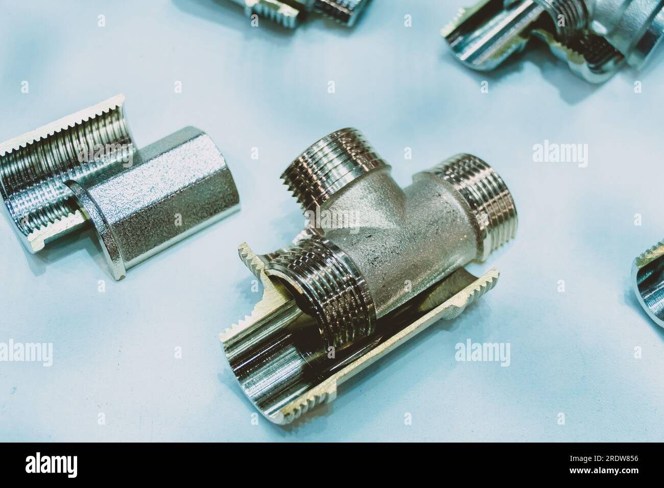 Threaded steel tee for pipe connection in section Stock Photo - Alamy