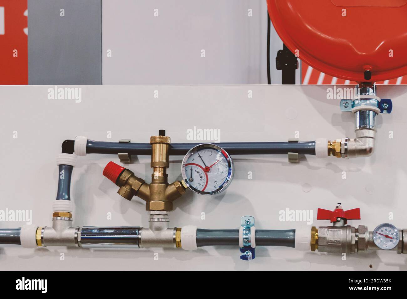 Heating system. Engineering plumbing. Pipe connections Stock Photo - Alamy