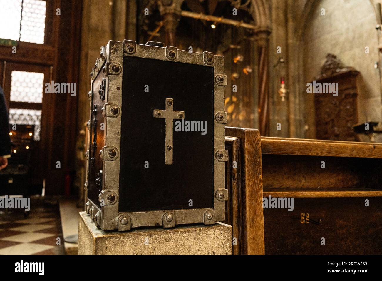 An old chest container box for collecting donations and alms in a ...