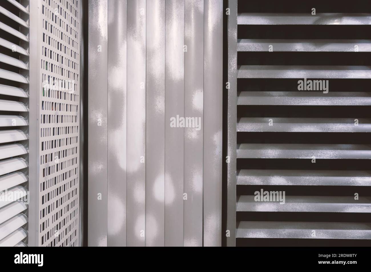 System of metal blinds vertical and horizontal Stock Photo - Alamy