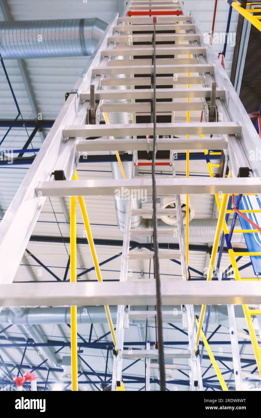 Aluminum one-sided ladders indoors close-up Stock Photo - Alamy