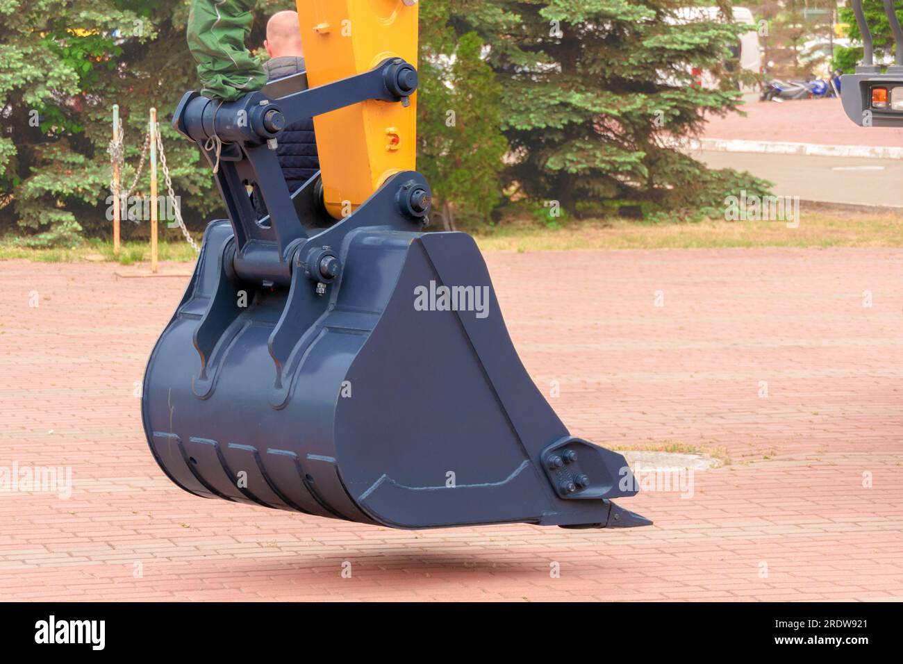 Metal bucket of an excavator close-up Stock Photo - Alamy