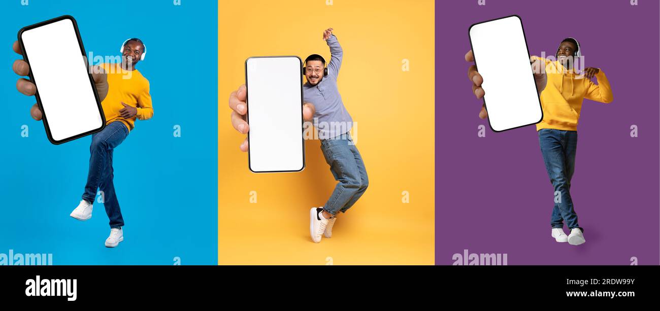 Happy multiethnic guys with headphones showing phones on colorful ...