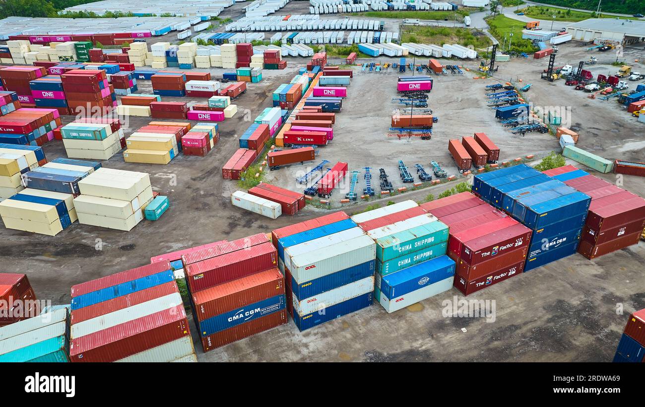 Stacked walls of metal shipping crates in container yard Stock Photo ...