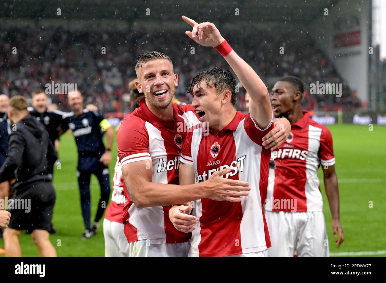 ANTWERP - players and trainer coach with the championship scale of ...