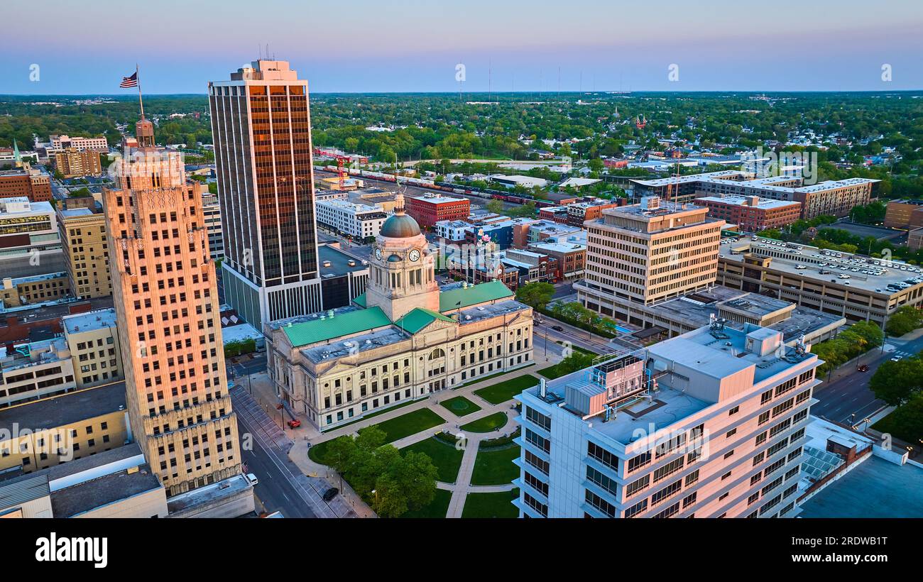 Sunrise off building skyscraper windows courthouse and train downtown ...