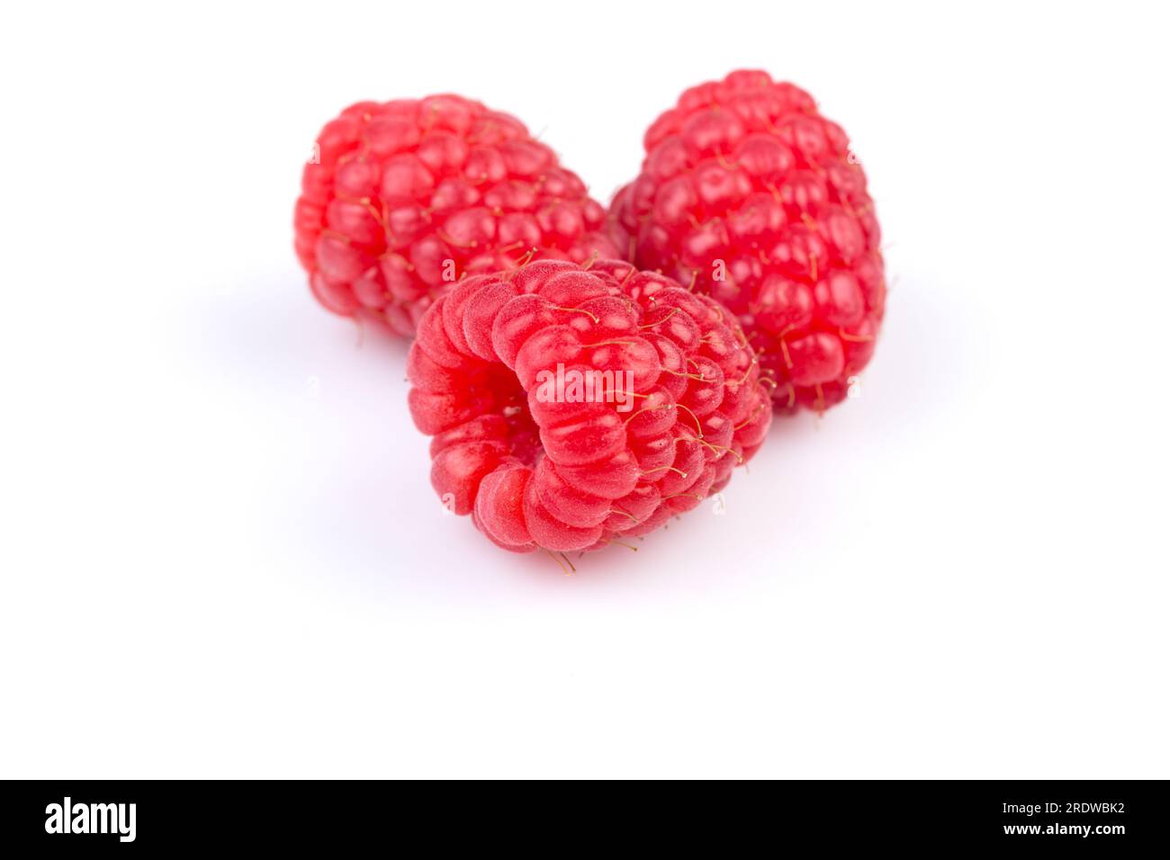 Fresh raspberry isolated on a white background Stock Photo - Alamy