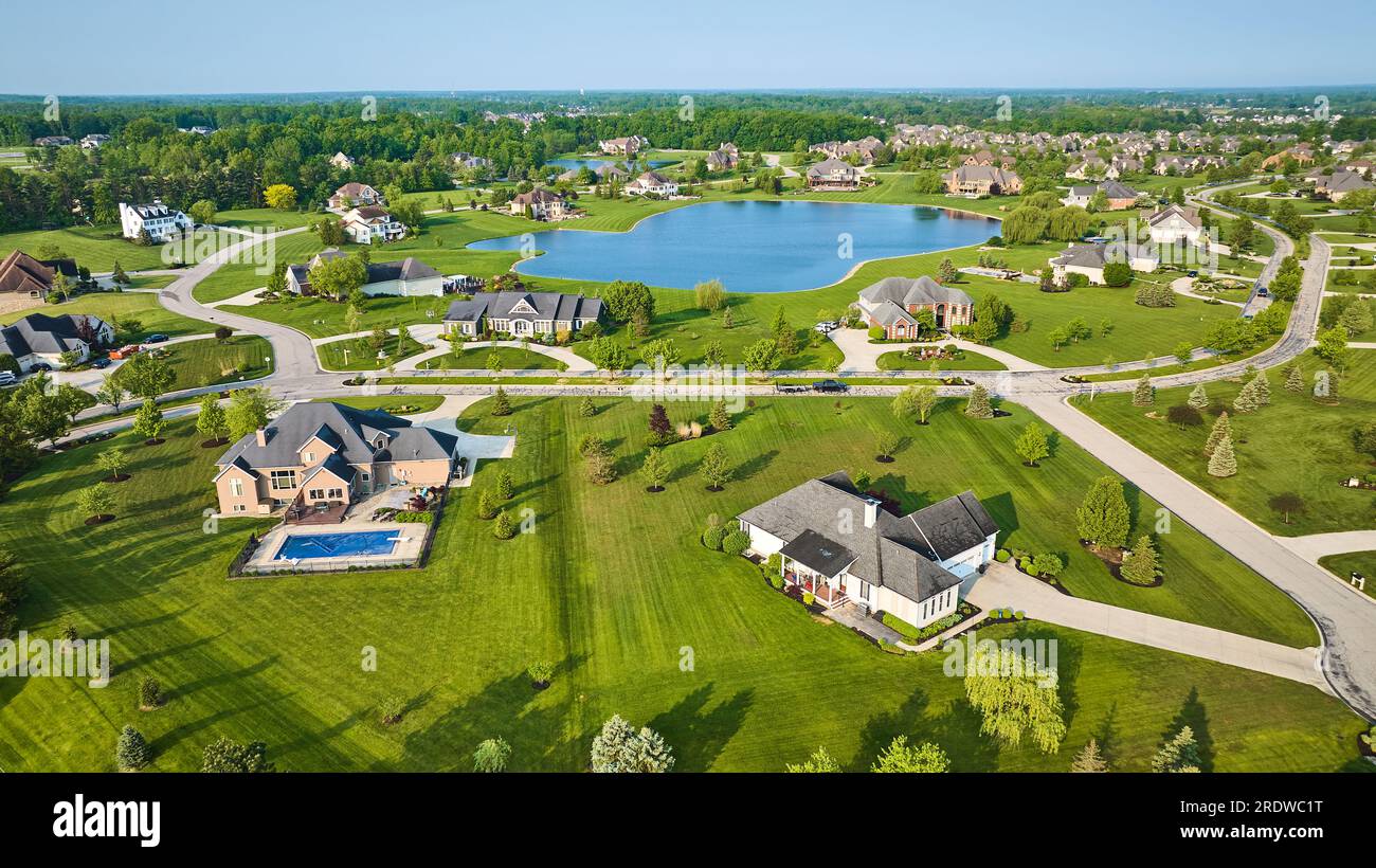 Residential community with lake side houses hi-res stock photography ...