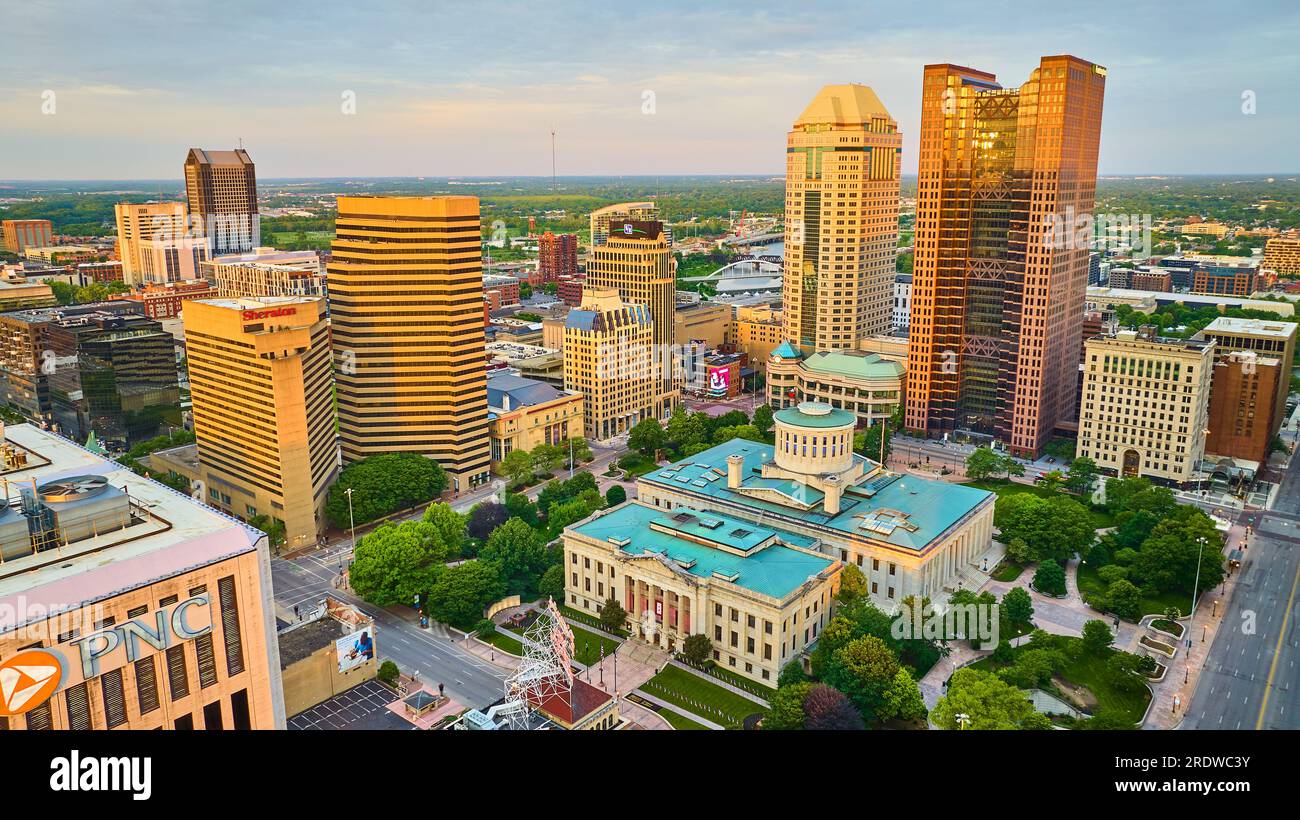 Capital Square Foundation at sunrise with sun on skyscrapers aerial ...