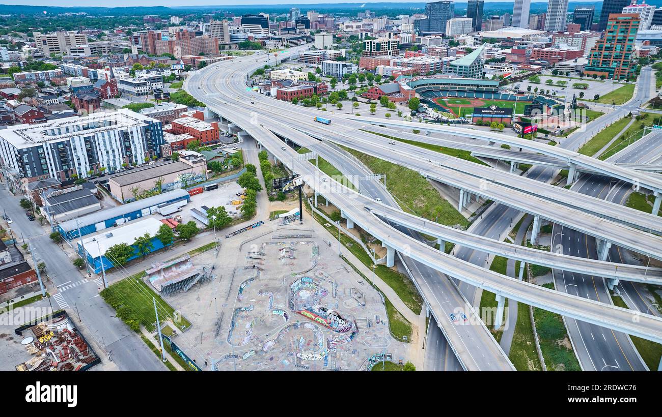 Massive highway system in Louisville KY aerial with skateboard park and ...