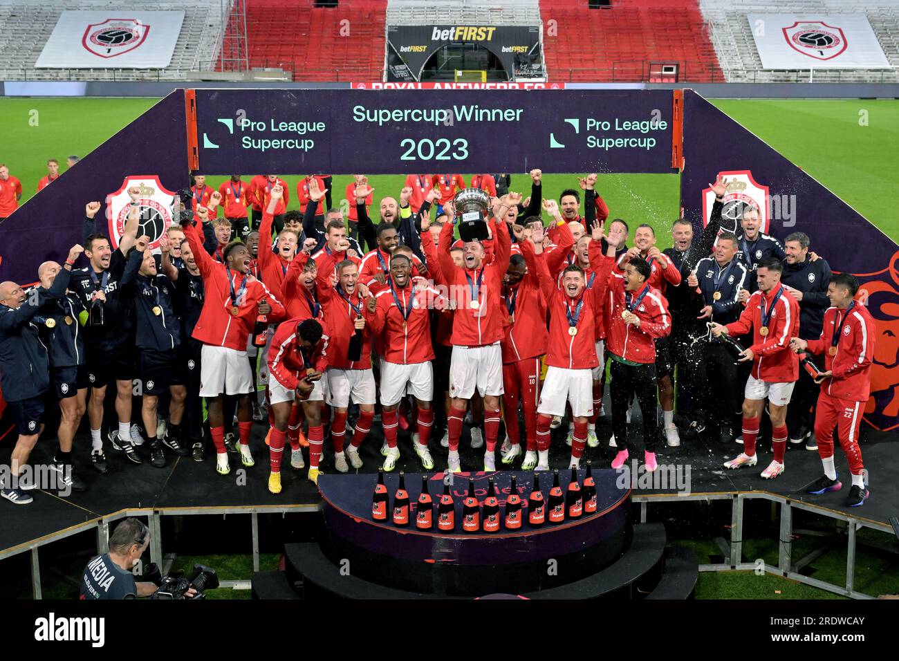 ANTWERP - players and trainer coach with the championship scale of ...
