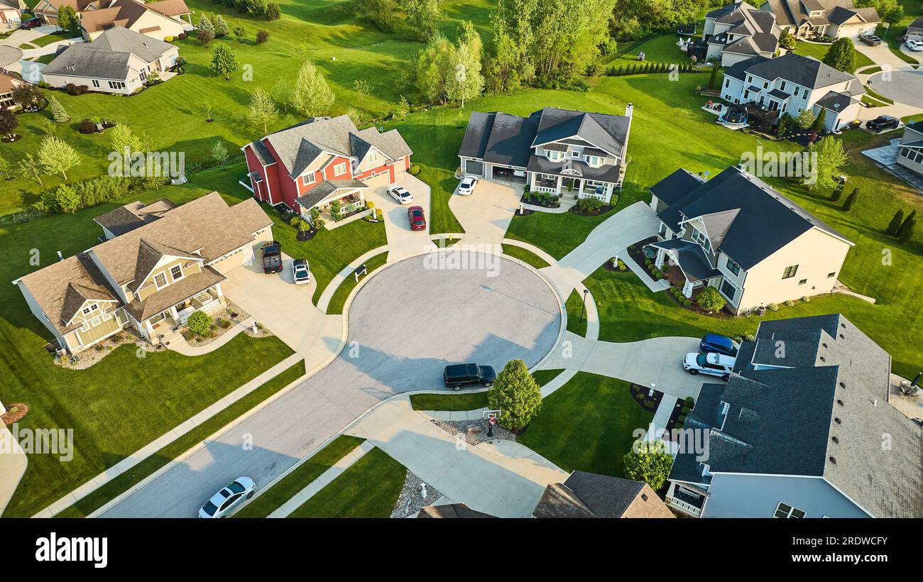 Cul-de-sac of various house colors with police car USA rich homes ...