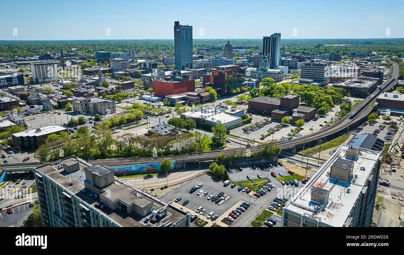 Cityscape downtown Fort Wayne IN with train tracks and train bridge ...