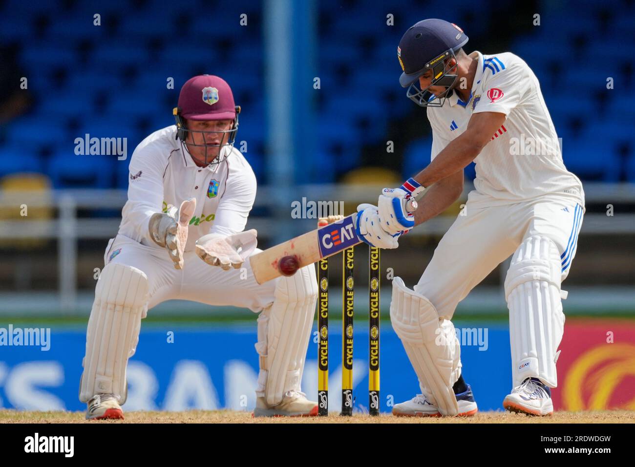 India's Shubman Gill plays a shot from the bowling of West Indies ...