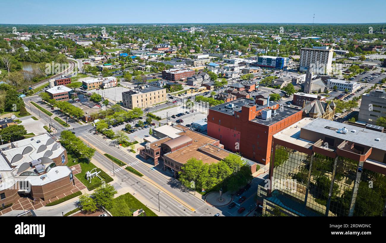 Downtown parking lots, businesses, buildings, housing, churches ...