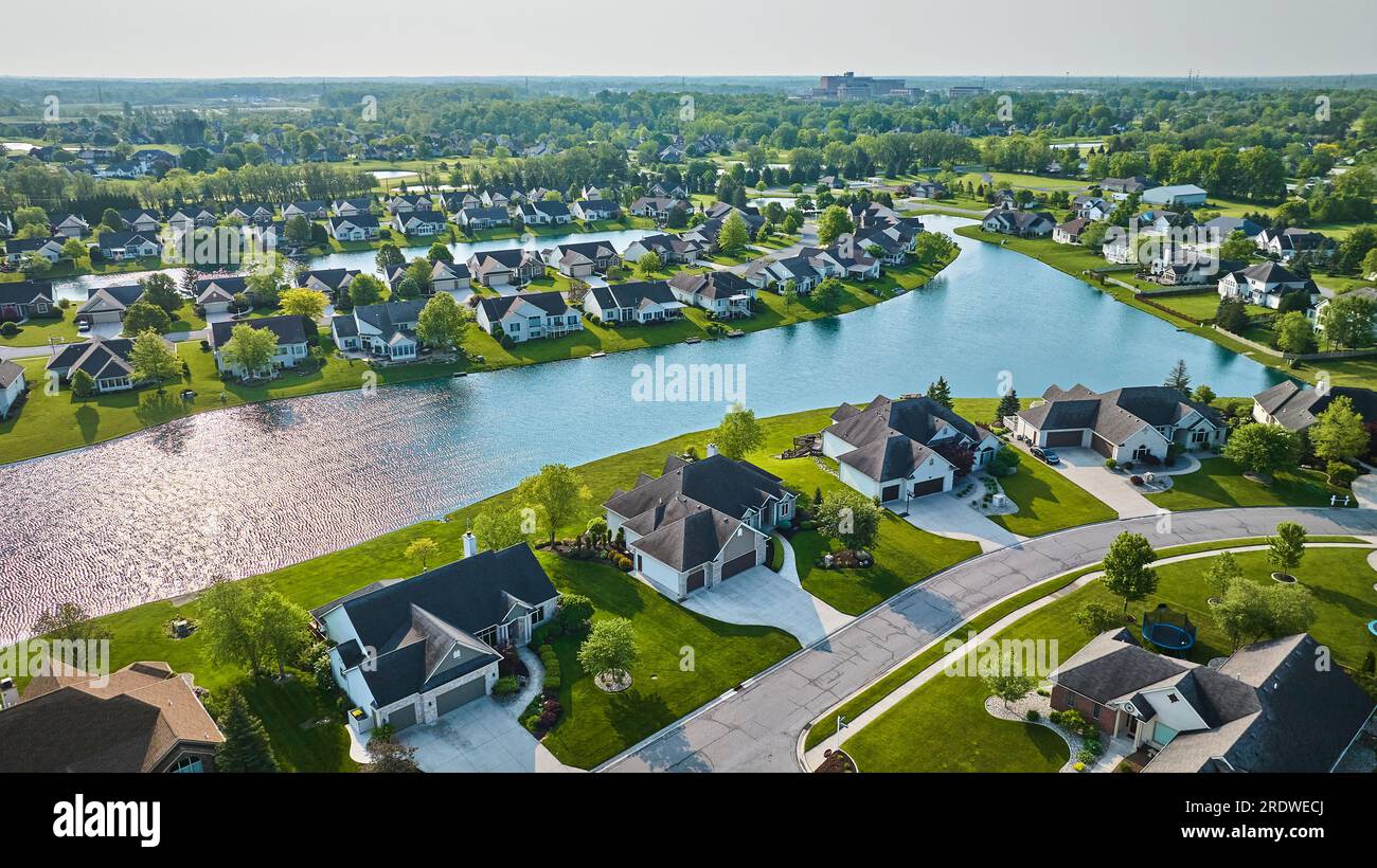 Pondside houses in rich expensive neighborhood housing addition with ...