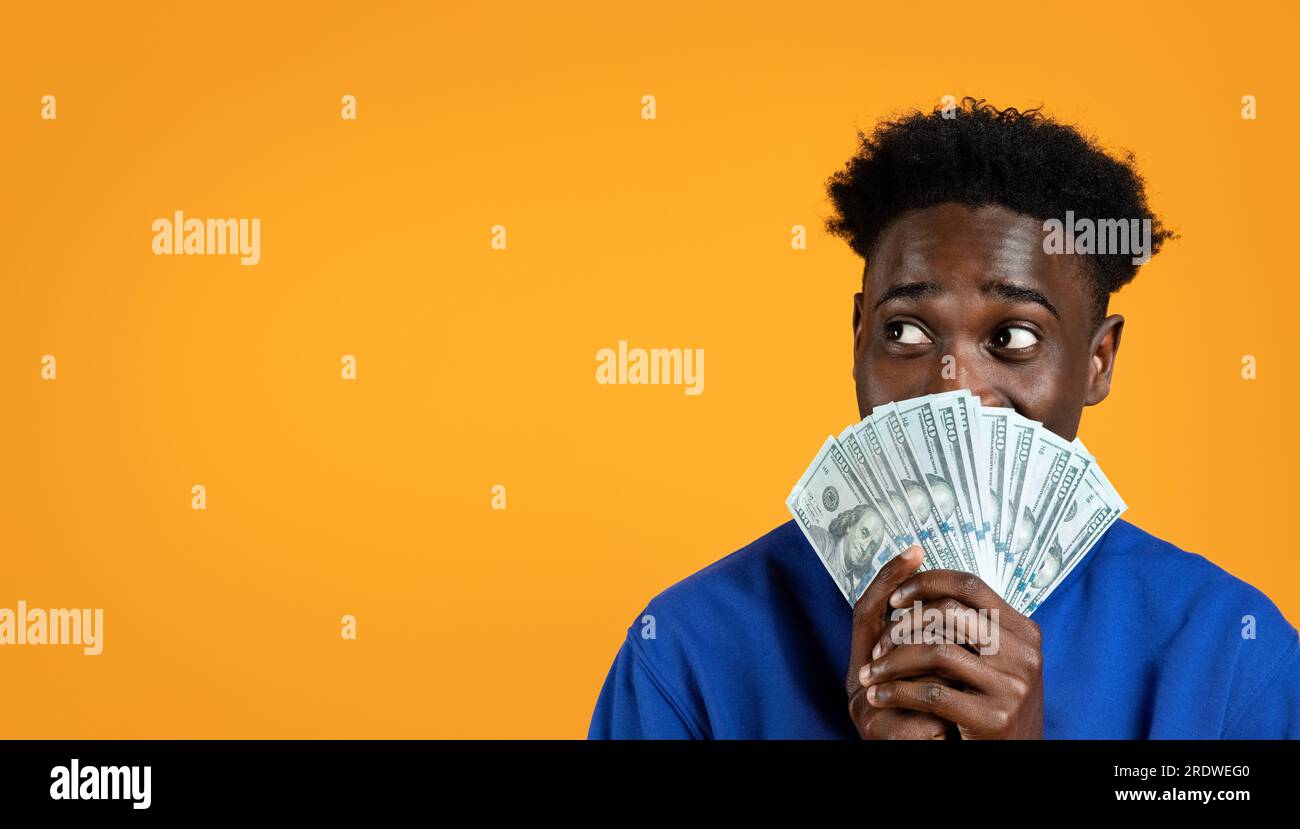 African american man usd cash hi-res stock photography and images - Alamy