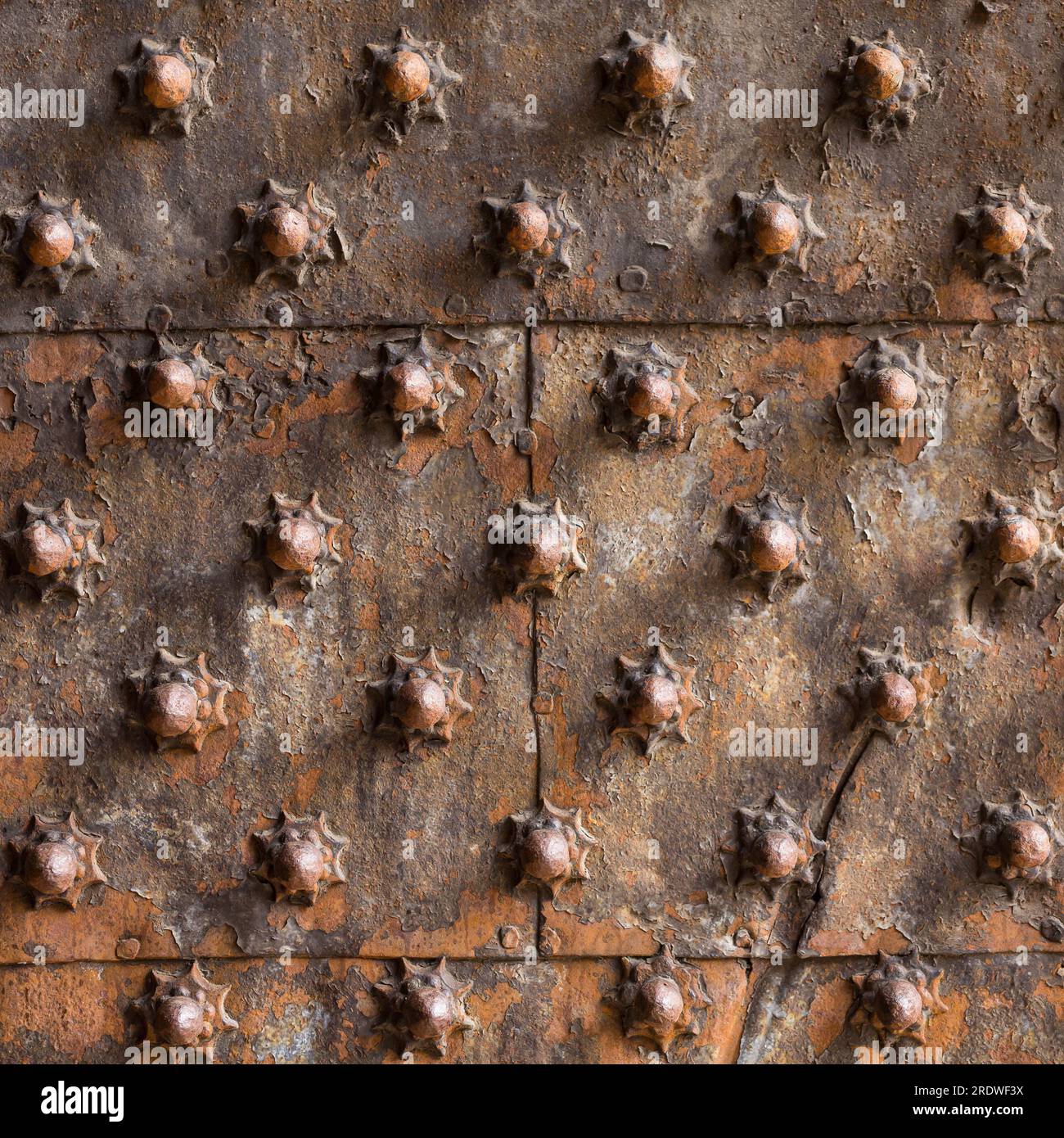 Ancient wooden spiked door detail in Genoa, Italy Stock Photo - Alamy