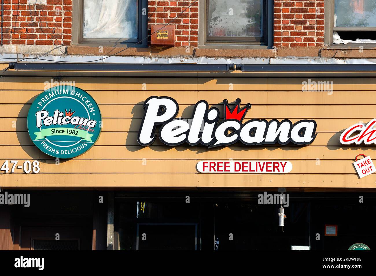 Signage of a Pelicana Chicken 페리카나 Korean fried chicken fast casual ...