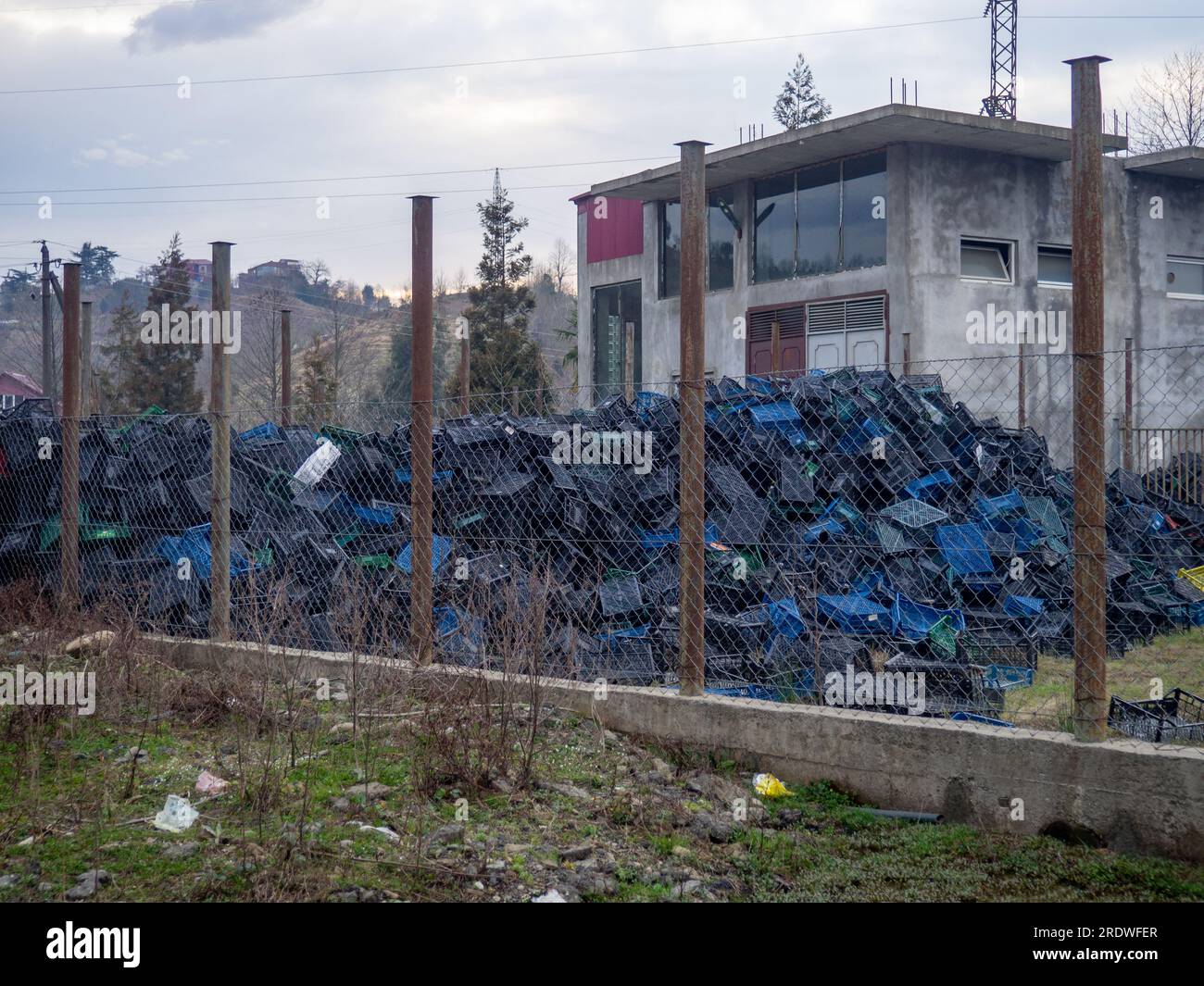Mountains of fruit boxes. Former packaging. Lots of plastic boxes ...