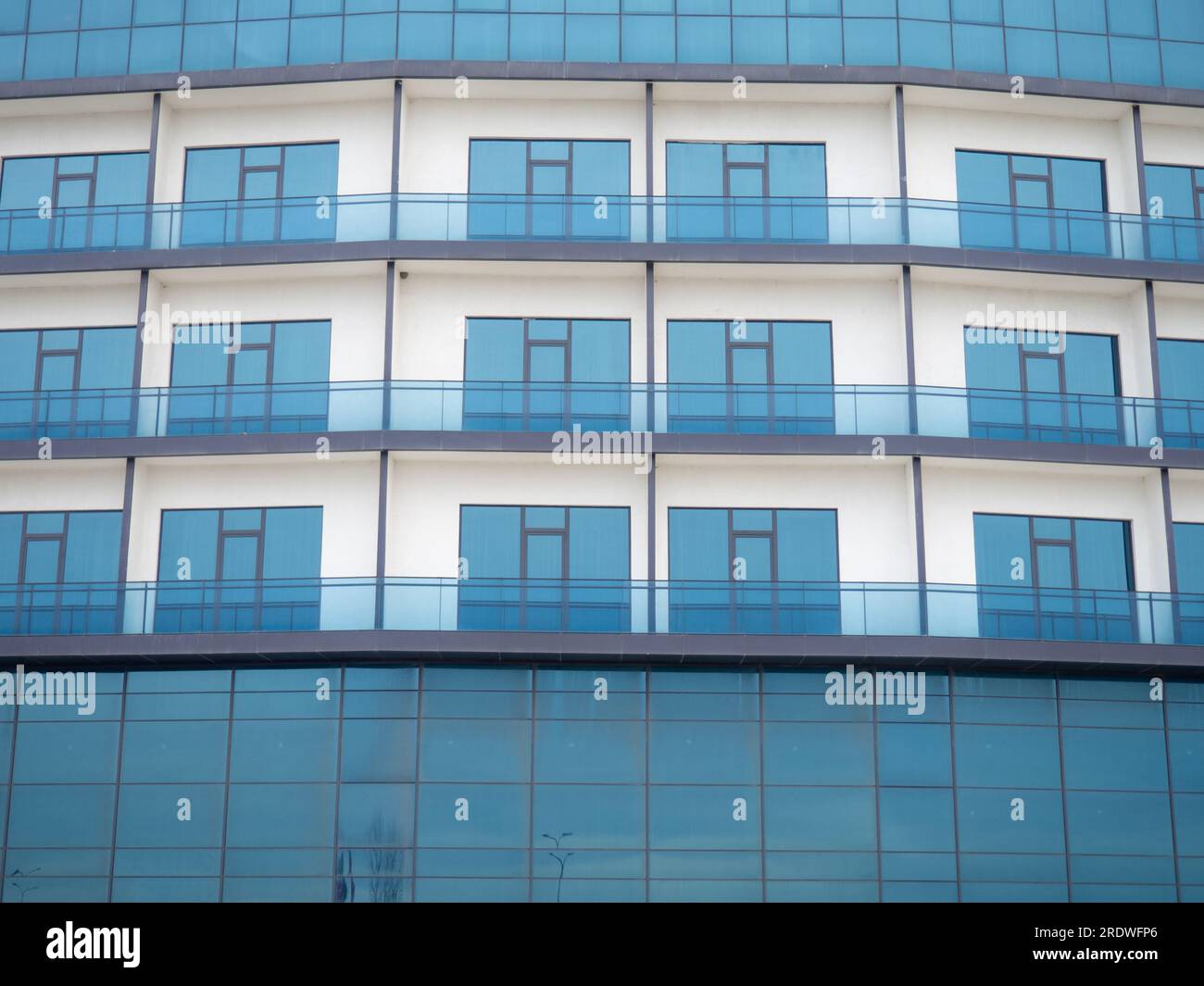 Facade of a modern blue house. New house. Windows pattern. Uninhabited ...