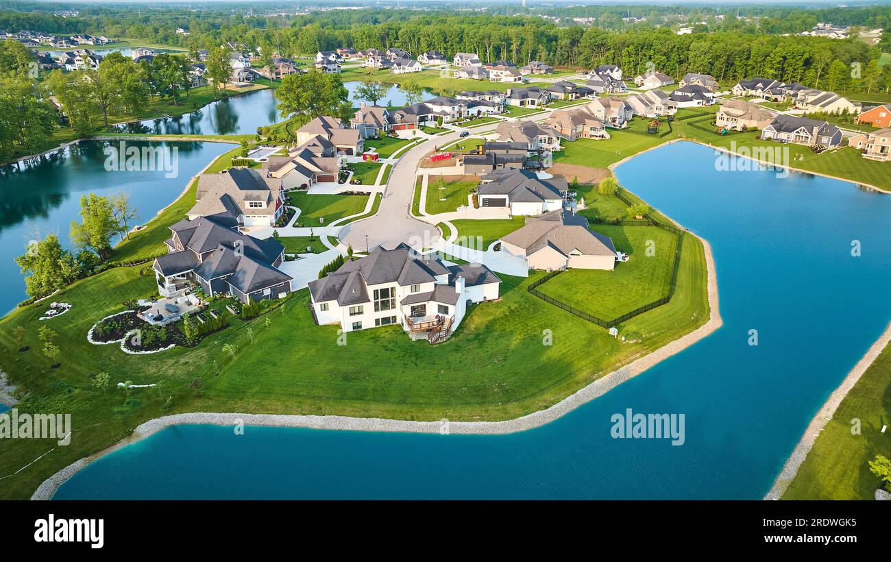 Giant pond rich neighborhood cul-de-sac million-dollar mini mansion ...