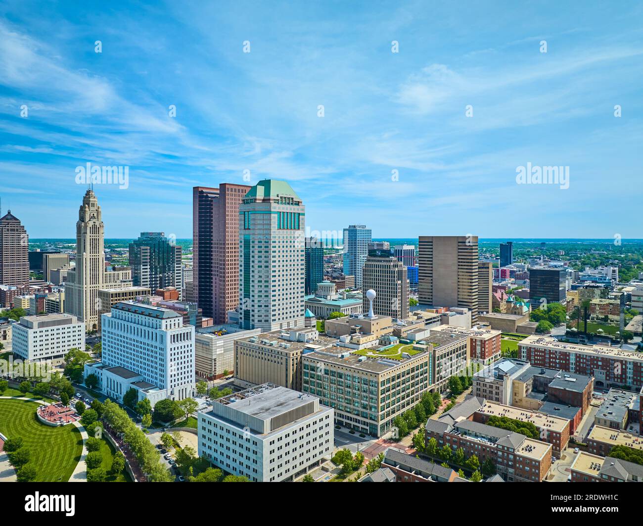 Blue sky with wispy clouds over downtown Columbus Ohio in summer aerial ...