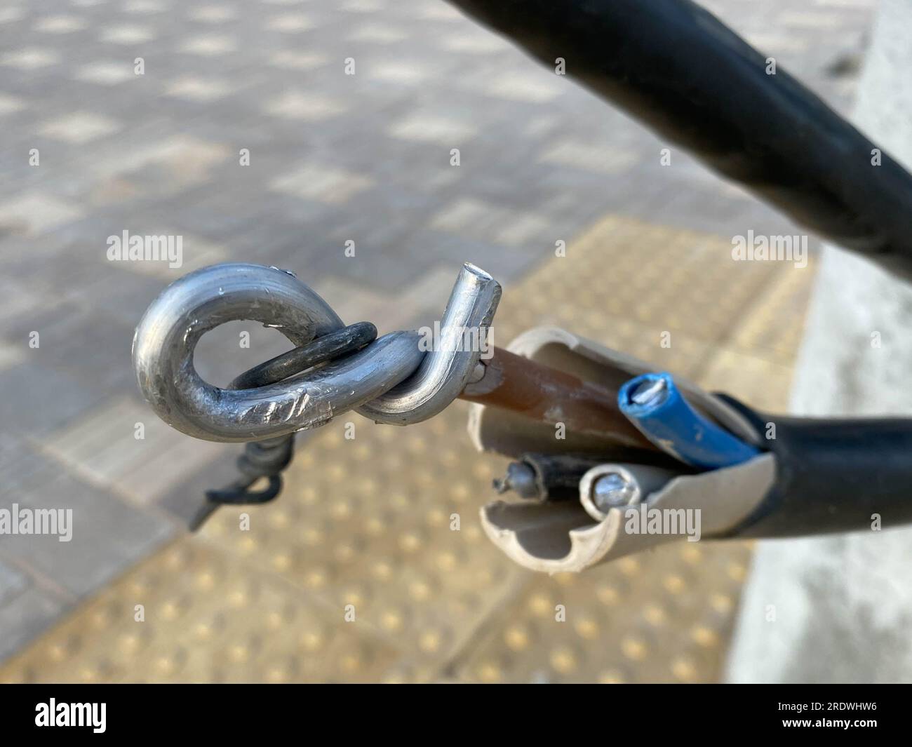 A close-up view of a thick cross-sectional industrial aluminum cable in ...