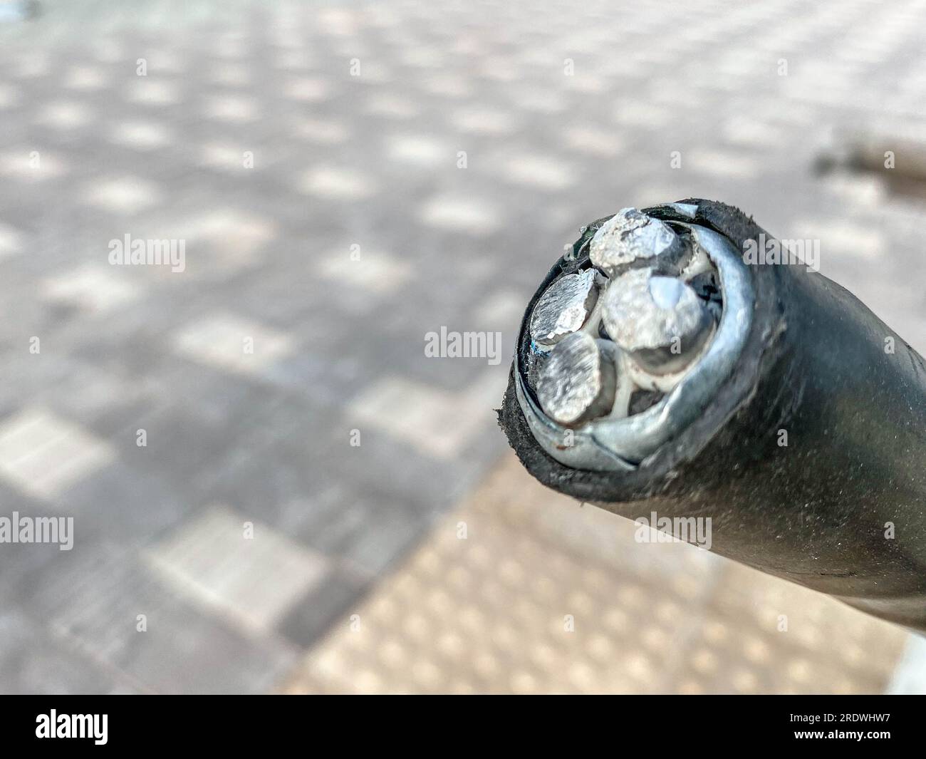 metal wire with protruding electrical wiring. laying of heat and power ...